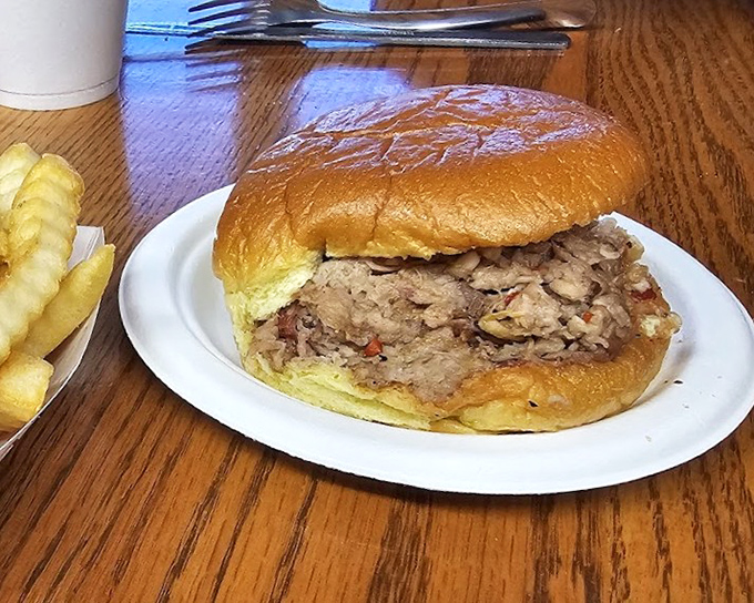 The sandwich that stops conversations mid-sentence. Tender pulled pork on a pillowy bun&mdash;simplicity that reaches transcendence.