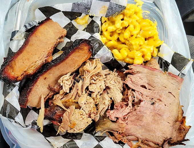 Meat candy in its purest form&mdash;brisket with that telltale smoke ring, pulled pork with perfect texture, and mac and cheese playing the perfect supporting role.