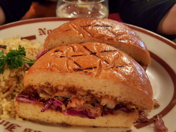 Their pulled pork sandwich isn't just a meal – it's architecture. Layers of smoky goodness nestled between grilled bread that's somehow both substantial and yielding.