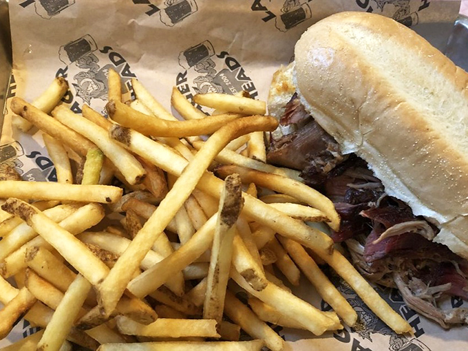 The pulled pork sandwich doesn't just satisfy hunger – it resolves existential crises. Those golden fries aren't merely sides; they're supporting actors deserving their own award.