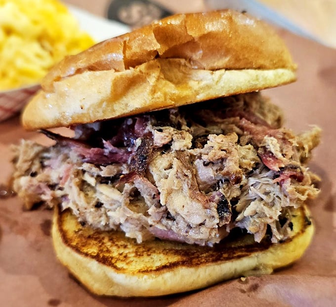 The pulled pork sandwich: a mountain of tender, smoky meat that makes you wonder why you'd ever eat anything else.