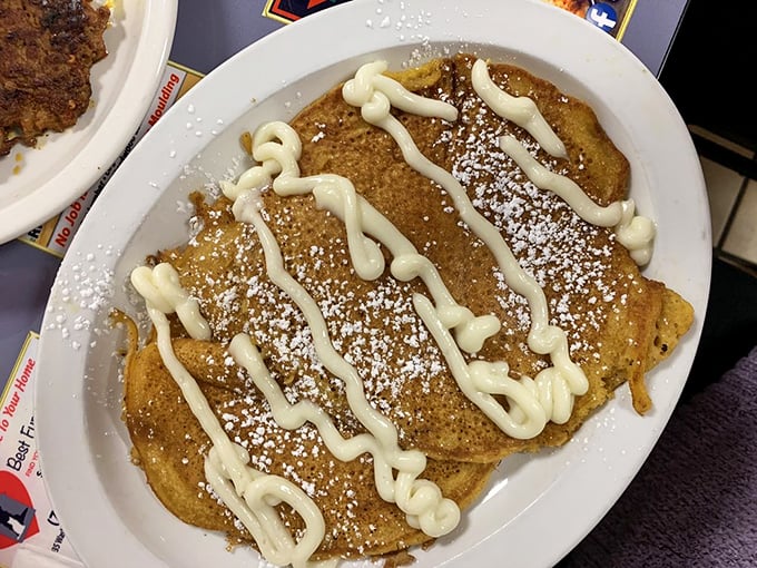 These pancakes aren't just drizzled&mdash;they're lovingly painted with cream cheese glaze, like Jackson Pollock decided to become a breakfast chef.