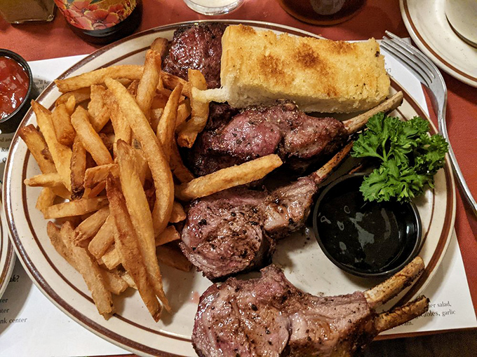Lamb chops that make you understand why medieval kings fought wars over livestock. The char marks tell stories of oak fire mastery and patient cooking.
