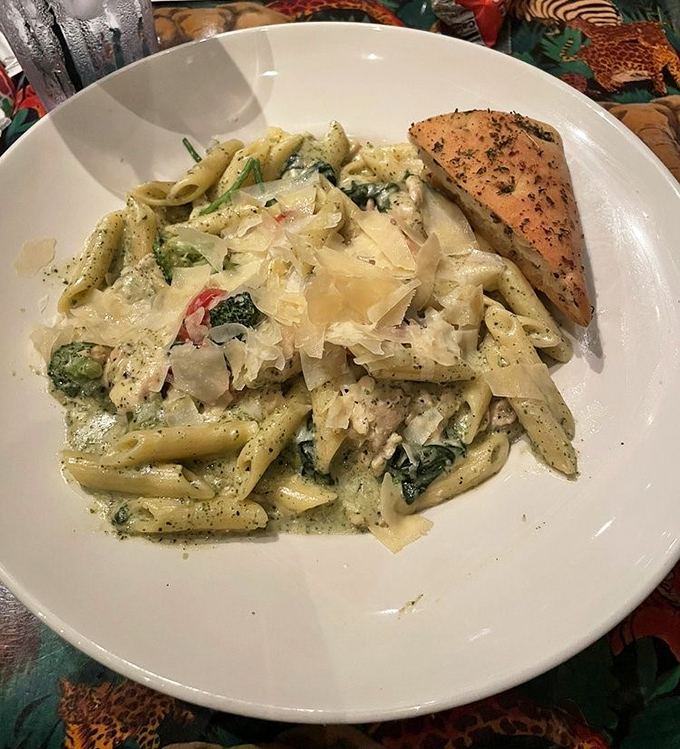 Pasta that would make both Italian grandmothers and Caribbean chefs nod in approval &ndash; creamy, herbaceous, and paired with perfectly grilled salmon.