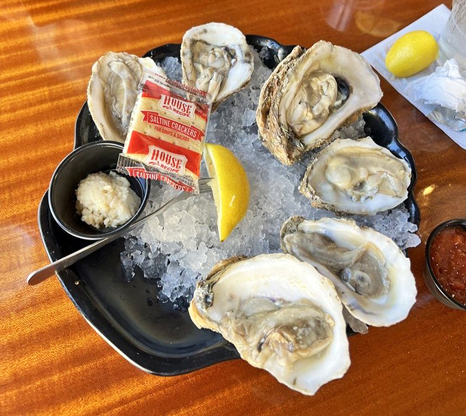 These oysters aren't just served; they're presented on a throne of ice. Nature's perfect appetizer &ndash; briny, fresh, and requiring nothing more than a squeeze of lemon. 