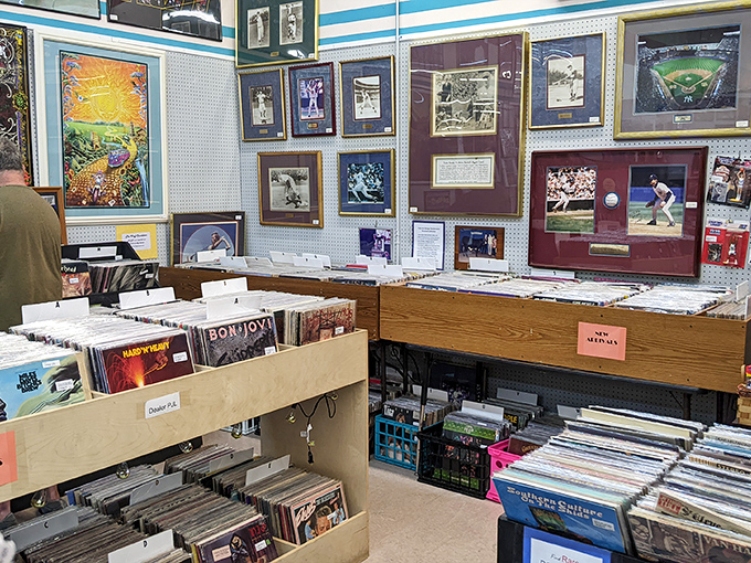 Album collectors, rejoice! Bon Jovi sits alongside forgotten gems, while sports memorabilia watches over vinyl treasures like nostalgic guardians.