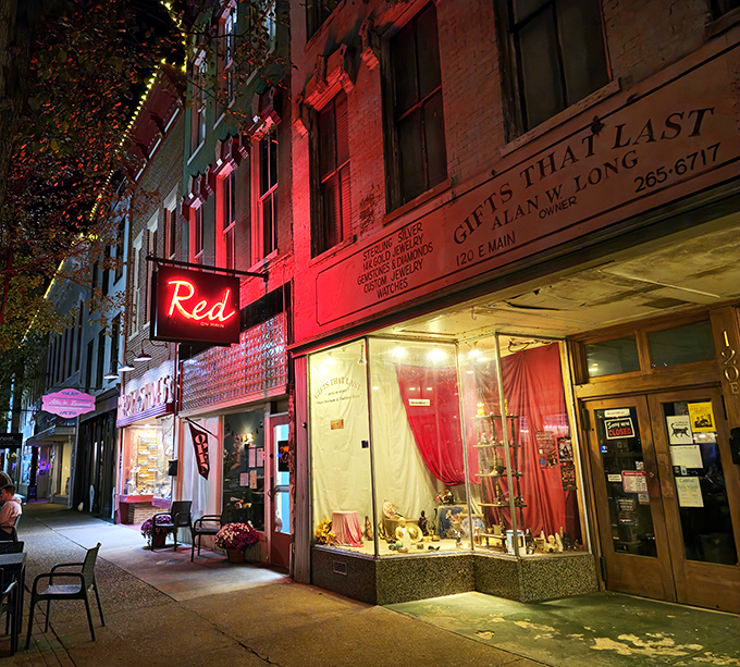 "Red" glows like a beacon for night owls in Madison. This Main Street shop window display proves small towns know a thing or two about style after dark.