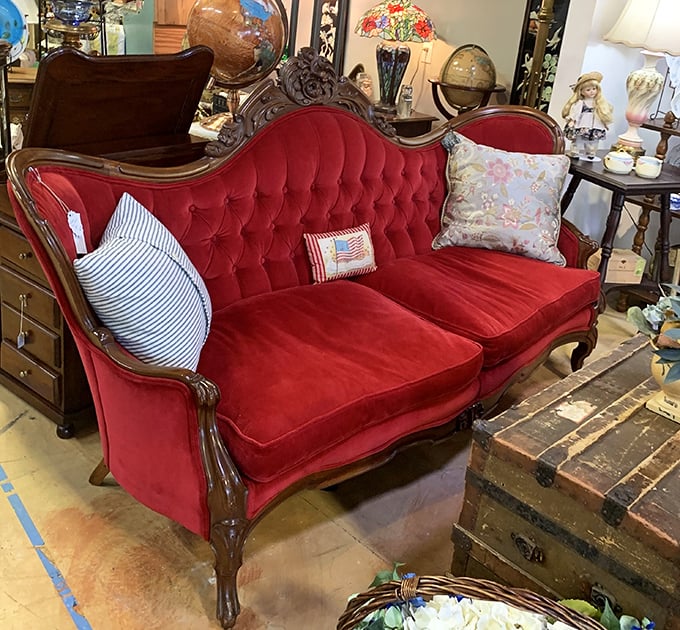 That red velvet Victorian sofa isn't just furniture&mdash;it's a statement piece that whispers, "Yes, you ARE fancy enough to own me."