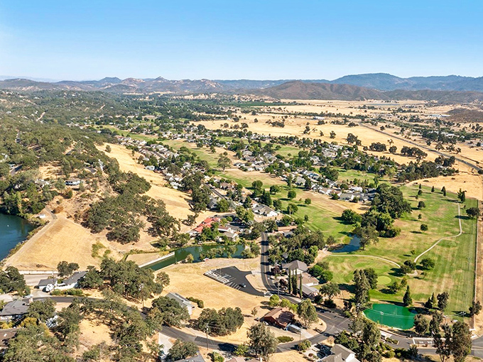 Where homes nestle into landscapes instead of competing with them—like a neighborhood that got a permission slip to blend with nature.