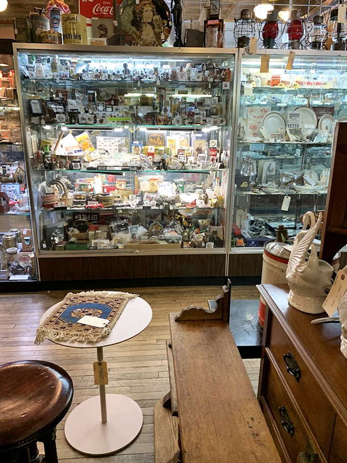 That typewriter wrote love letters before texting ruined romance, sitting pretty among its vintage friends.