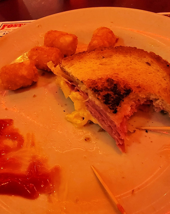 A proper Reuben should require both hands and several napkins. This beauty checks all the boxes with melty cheese cascading over the edges.