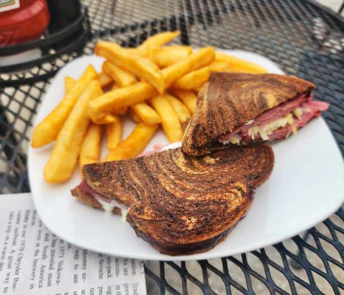 A Reuben sandwich that doesn't mess around. Grilled to perfection with enough corned beef to make your cardiologist nervously check their calendar.