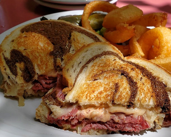 This isn't just a Reuben sandwich—it's architecture. Layers of corned beef, sauerkraut, and Swiss create the Taj Mahal of deli experiences.