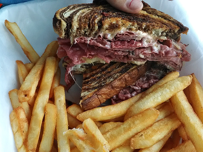The Reuben that launched a thousand cravings&mdash;marbled rye embracing a mountain of corned beef and Swiss in perfect harmony.