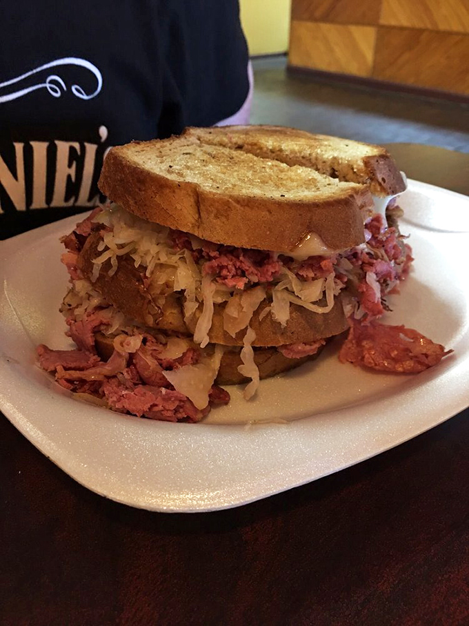 The Reuben that ate Manhattan. Corned beef and sauerkraut stacked so high you'll need to unhinge your jaw like a python.