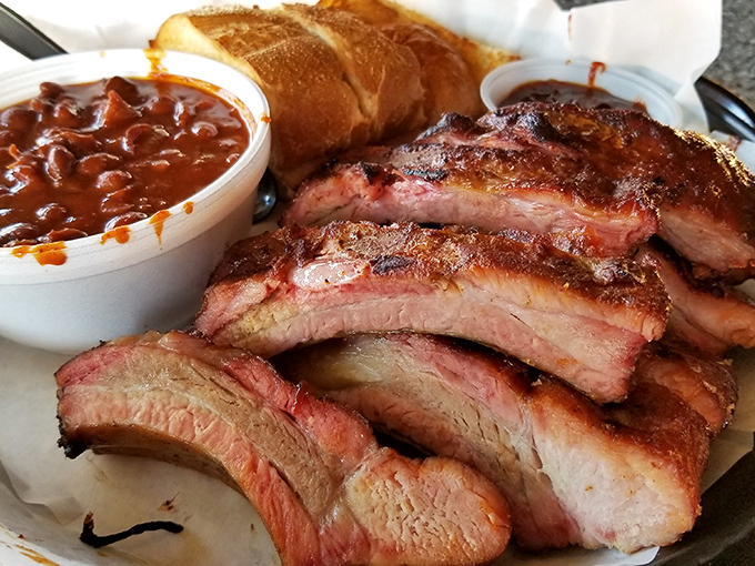Smoke rings don't lie. These ribs showcase the telltale pink edge that barbecue aficionados recognize as the signature of proper low-and-slow cooking.