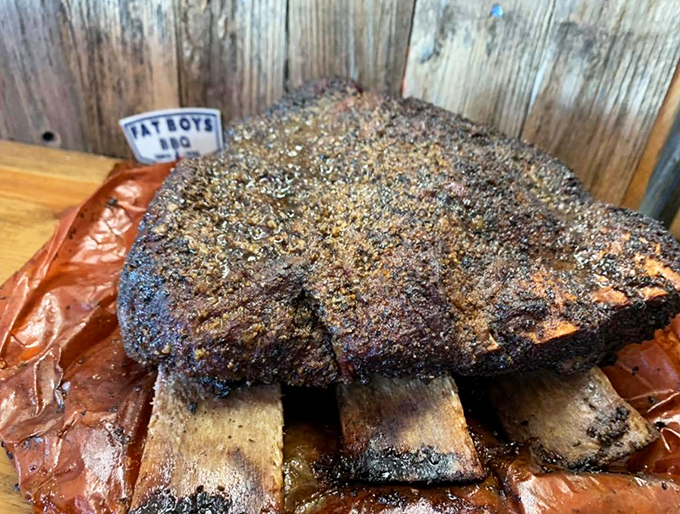 These ribs don't just fall off the bone – they've negotiated a perfect treaty between tenderness and texture that would make diplomats jealous.