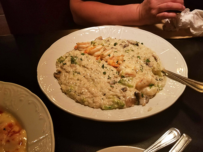 Risotto that doesn't just sit on the plate but performs &ndash; creamy, studded with plump shrimp, and demanding your undivided attention with every forkful.
