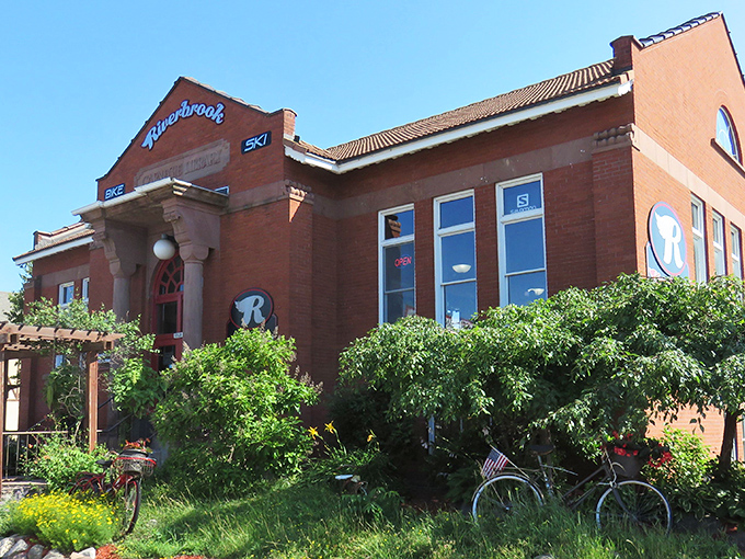 Riverbrook Bike & Ski Shop stands ready in its brick building, like a basecamp for adventures waiting to happen in Hayward's outdoor playground.