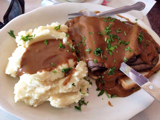 Hot roast beef with gravy and mashed potatoes&mdash;the kind of meal that makes you want to hug the chef and take a nap afterward.