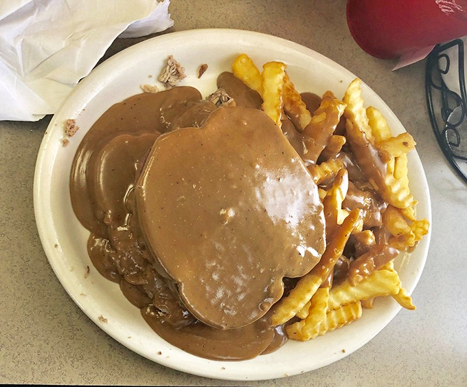Hot roast beef with gravy: where comfort food meets cardiac event, and somehow you're perfectly okay with that.