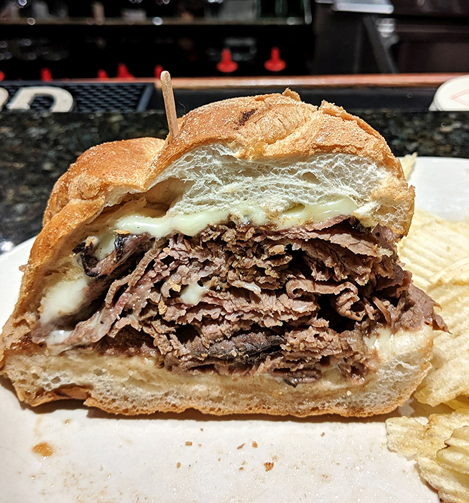 This isn't just a sandwich&mdash;it's an engineering marvel of thinly sliced roast beef. The bread is merely the delivery system for this meaty masterpiece.