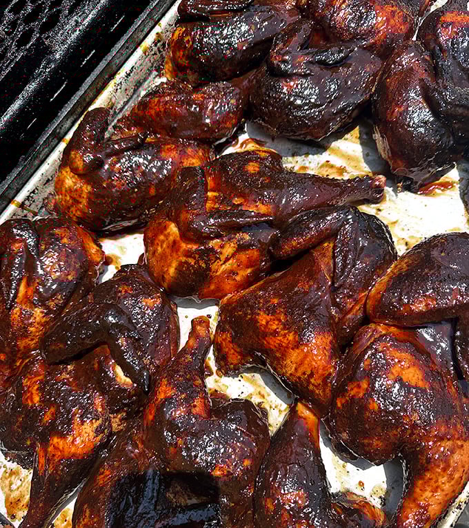These BBQ chicken pieces aren't just cooked, they're transformed &ndash; glistening with sauce and sporting that perfect char that makes you want to lick your fingers clean.