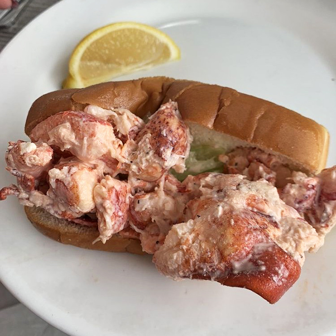 Lobster roll heaven! Chunks of sweet meat barely contained by a toasted bun&mdash;this isn't a sandwich, it's a celebration with a lemon wedge.