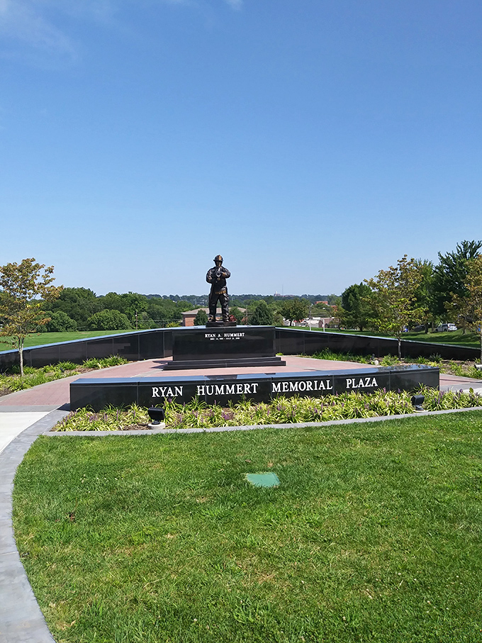 The Ryan Hummert Memorial Plaza stands as a dignified tribute, offering a peaceful spot for reflection amid beautifully maintained gardens.