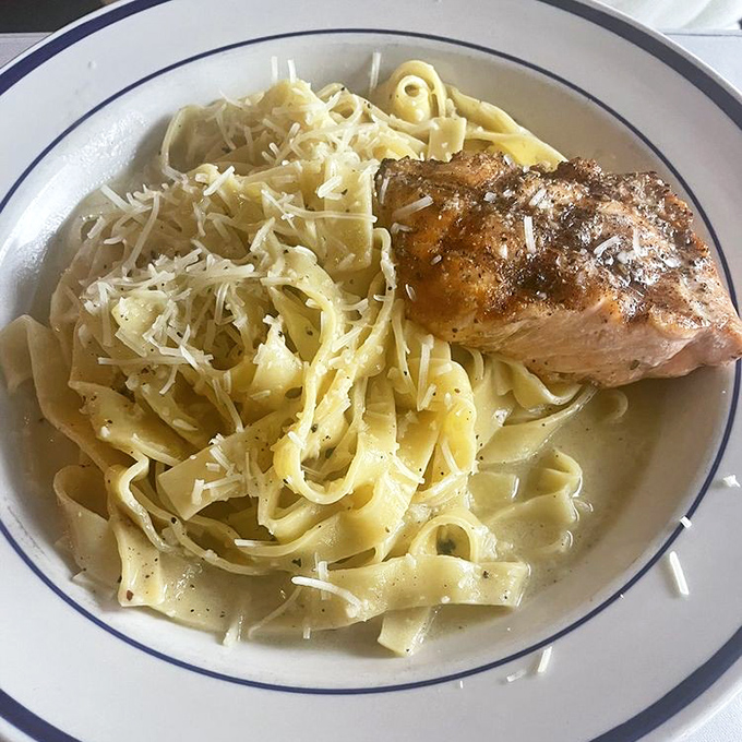 Fettuccine that's found its soulmate in a perfectly seared salmon fillet. Pasta romance at its finest.
