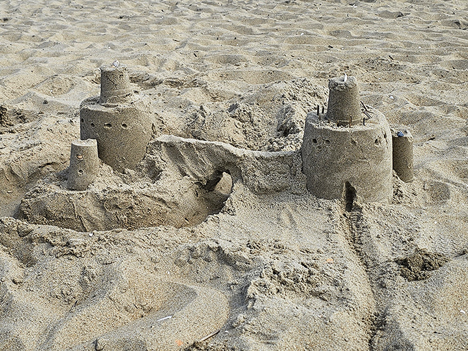 Architectural evidence that even sandcastles have real estate aspirations. No mortgage required, just a bucket, shovel, and boundless imagination.