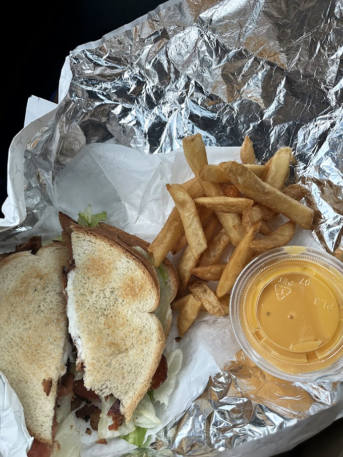 The classic cheesesteak with fries &ndash; a pairing so perfect it should have its own national holiday. That cheese sauce? Liquid gold.