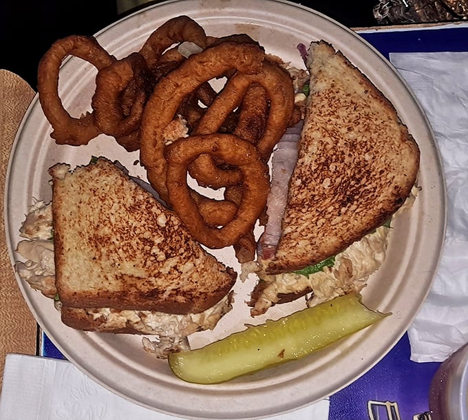 The tuna melt brings its A-game with golden-brown toast and a generous filling. That pickle isn't just garnish&mdash;it's necessary balance.