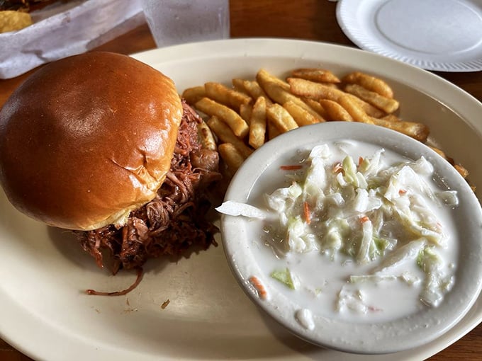 A pulled pork sandwich that doesn't need fancy frills&mdash;just a soft bun to cradle that smoky, tender meat while coleslaw stands by for cooling relief.