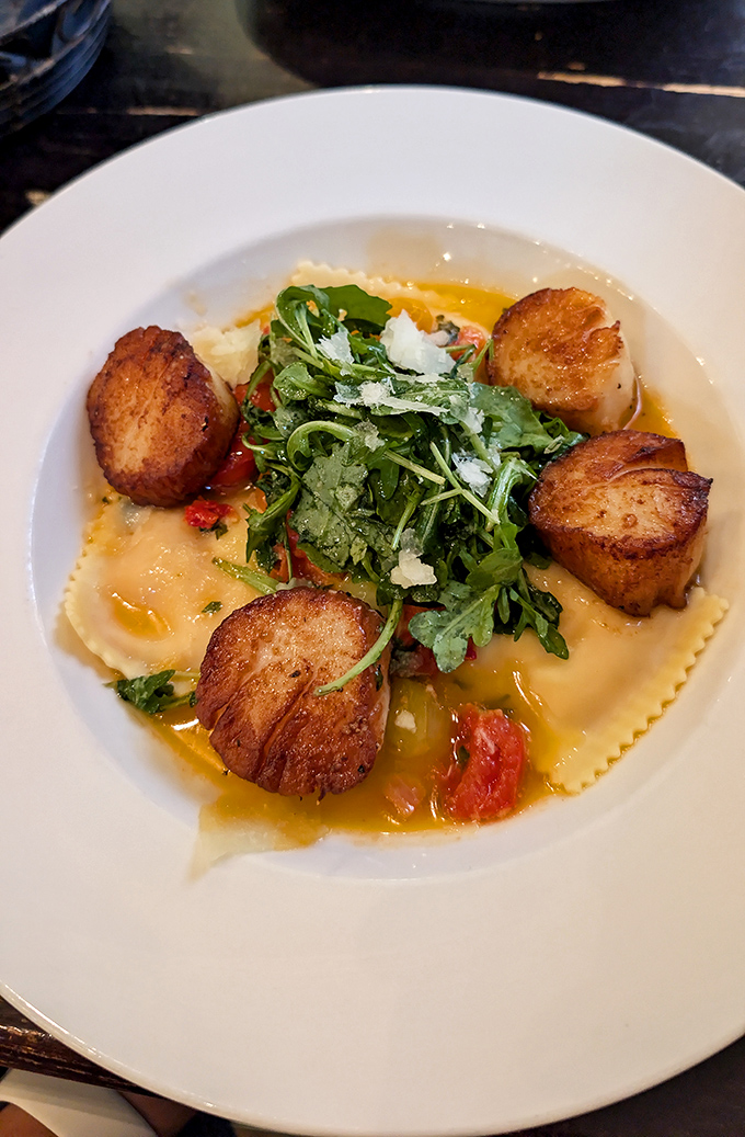 These seared scallops aren't just dinner&mdash;they're little golden discs of ocean perfection dancing around pasta like they own the place.