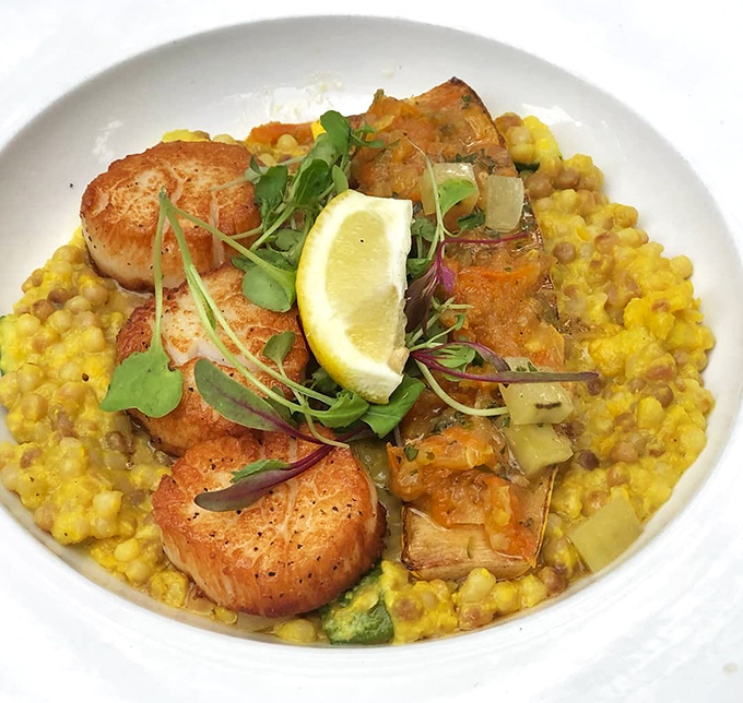 Scallops and couscous living their best life together - like Fred Astaire and Ginger Rogers, but edible.