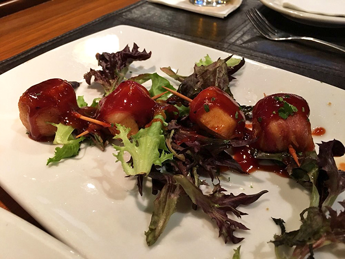 These bacon-wrapped scallops aren't just appetizers; they're little flavor bombs where smoky meets sweet in perfect harmony.