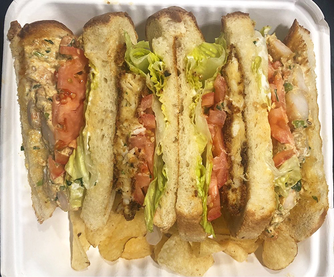 This seafood club sandwich doesn&rsquo;t just stack ingredients&mdash;it architects them into a masterpiece that makes lunch the day&rsquo;s main event.