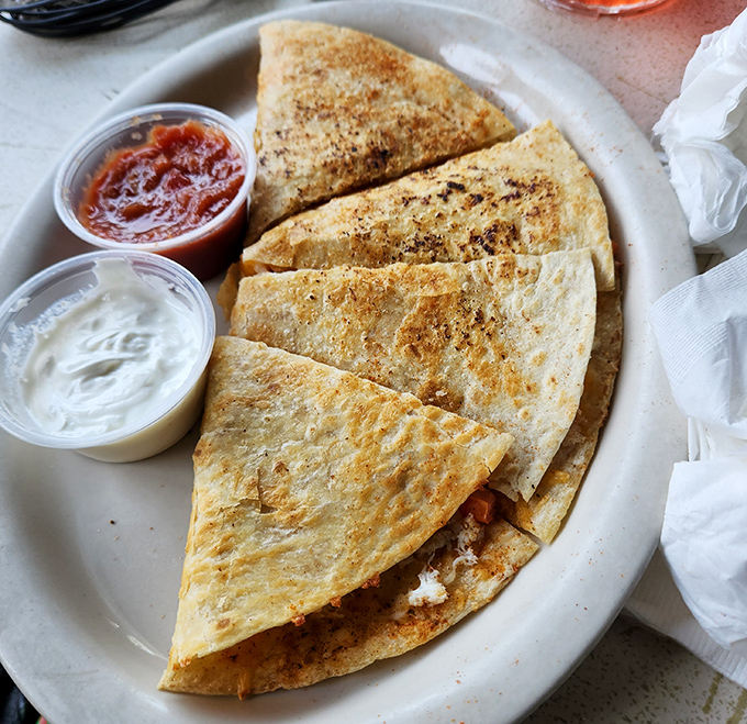 Quesadillas get the Maryland makeover with a seafood stuffing that makes you wonder why you ever settled for just cheese and chicken.