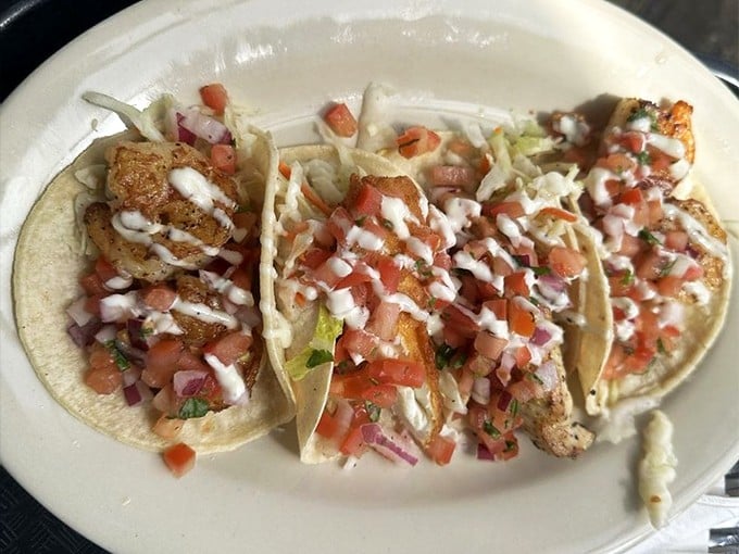 These seafood tacos aren't just Instagram-pretty&mdash;they're loaded with fresh pico de gallo and drizzled with sauce that ties everything together like a well-conducted orchestra.