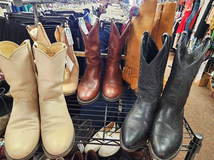 Cowboy boots with character line up like hopeful contestants at a Western dance-off. Each pair has kicked up dust on different adventures before finding their way here.