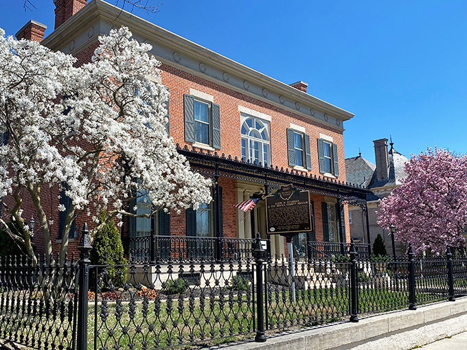 This historic home, framed by flowering trees, isn't roped off in some museum &ndash; it's part of Tiffin's living architectural heritage that makes every spring spectacular.
