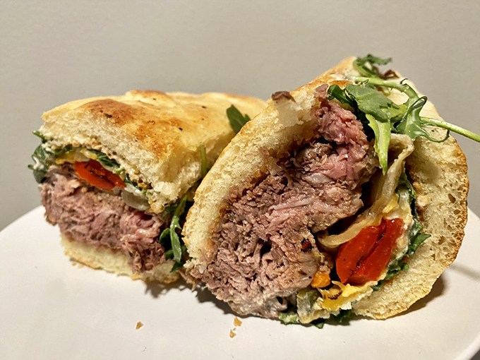Behold the Shaved Prime Rib&mdash;where tender meat meets melty cheese in holy matrimony. This isn't just a sandwich; it's a religious experience.