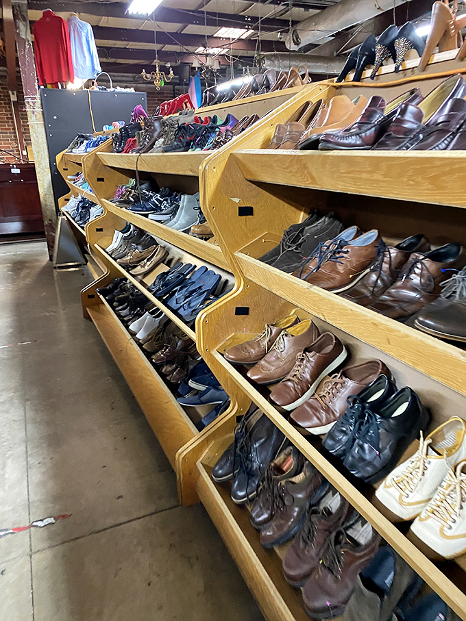 The shoe section: where leather loafers and vintage boots line up like hopeful contestants on a dating show, each one looking for its perfect match.