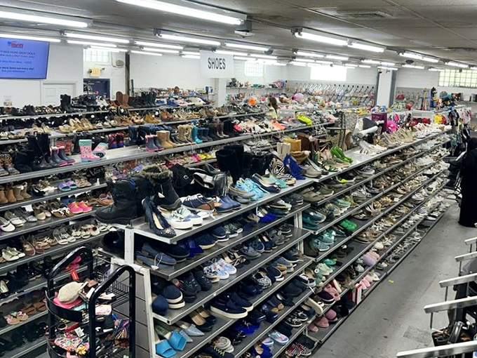 The shoe section stretches toward the horizon like a footwear promised land. Somewhere in this sea of soles, your perfect pair awaits.