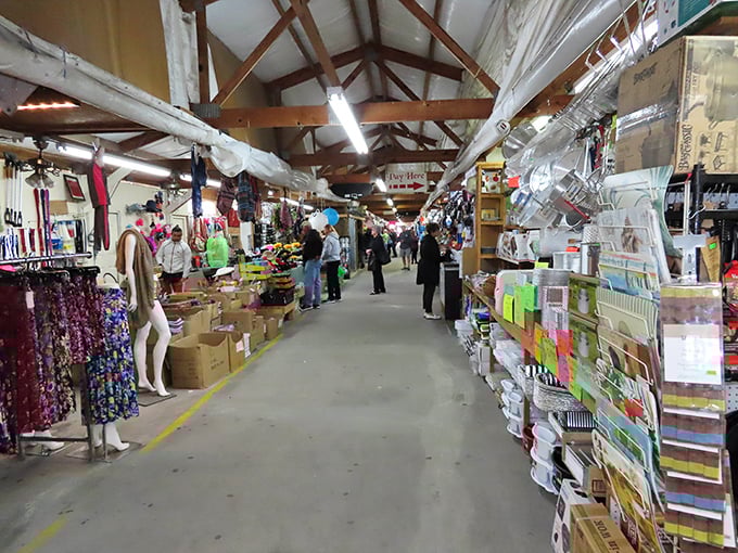 The thrill of the hunt brings shoppers from all walks of life. In these aisles, everyone becomes an archaeologist of Americana, unearthing yesterday's treasures.