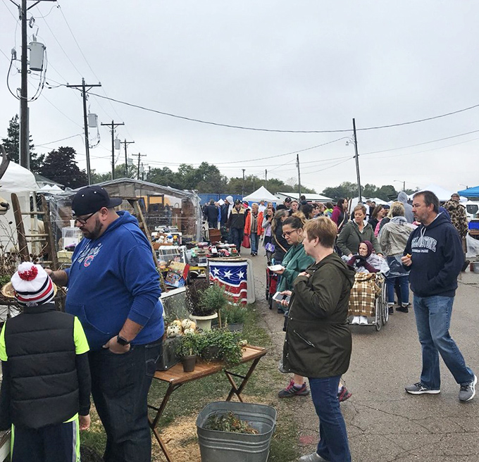 Treasure hunters navigate the crowded aisles with purpose. That determined look says they're not leaving without finding that one perfect piece.