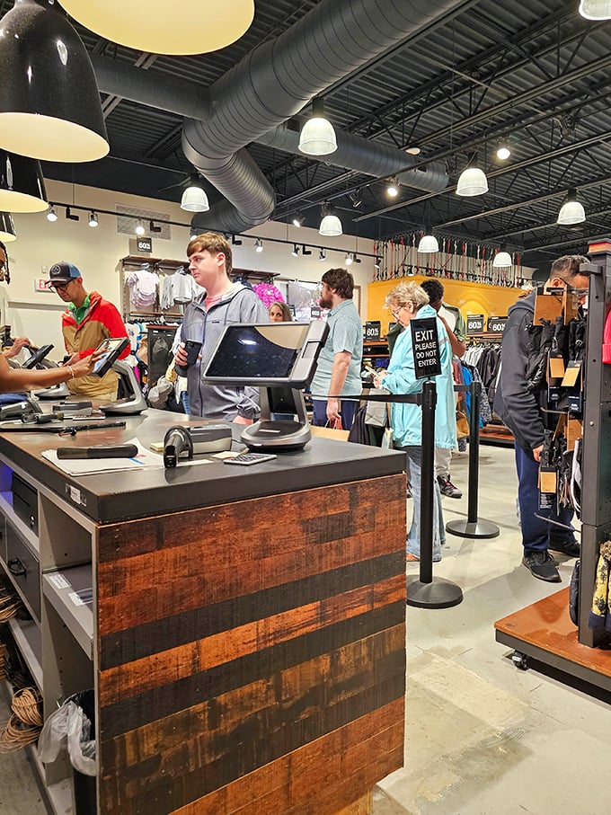 The checkout line: that magical moment when shoppers transform from bargain hunters to proud collectors of deals. Worth every minute of the wait.