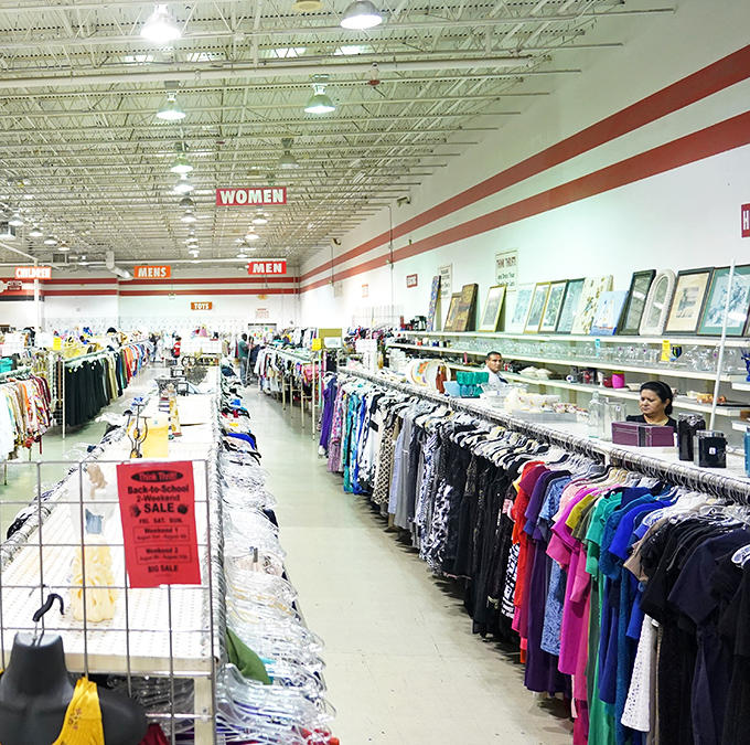 The women's department: where vintage blouses and contemporary tops coexist in chromatic harmony. That yellow mannequin has seen fashion trends come and go.