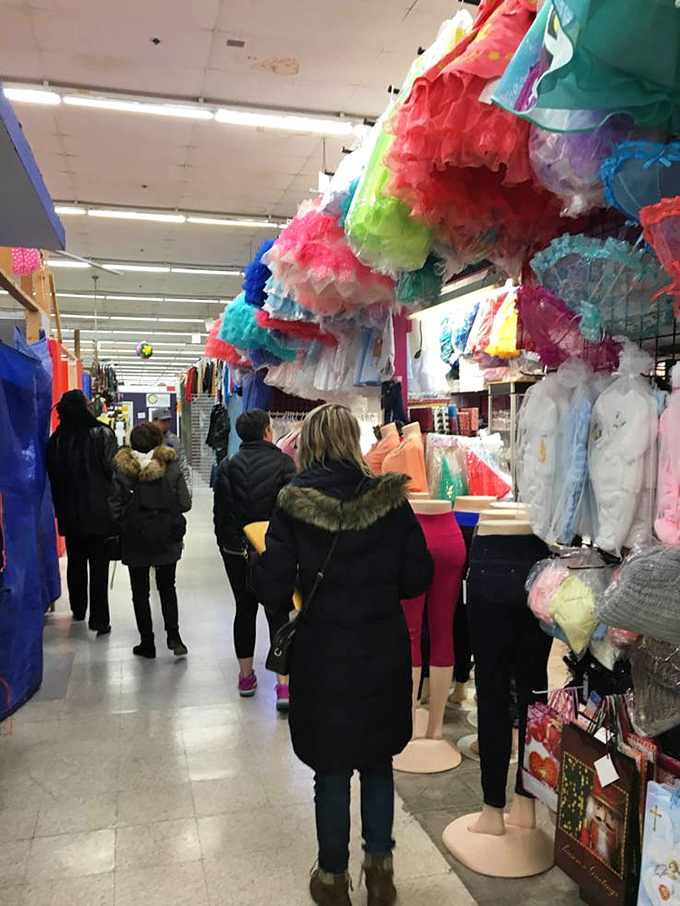 Fellow treasure hunters navigate the aisles like explorers discovering their next perfect find together.